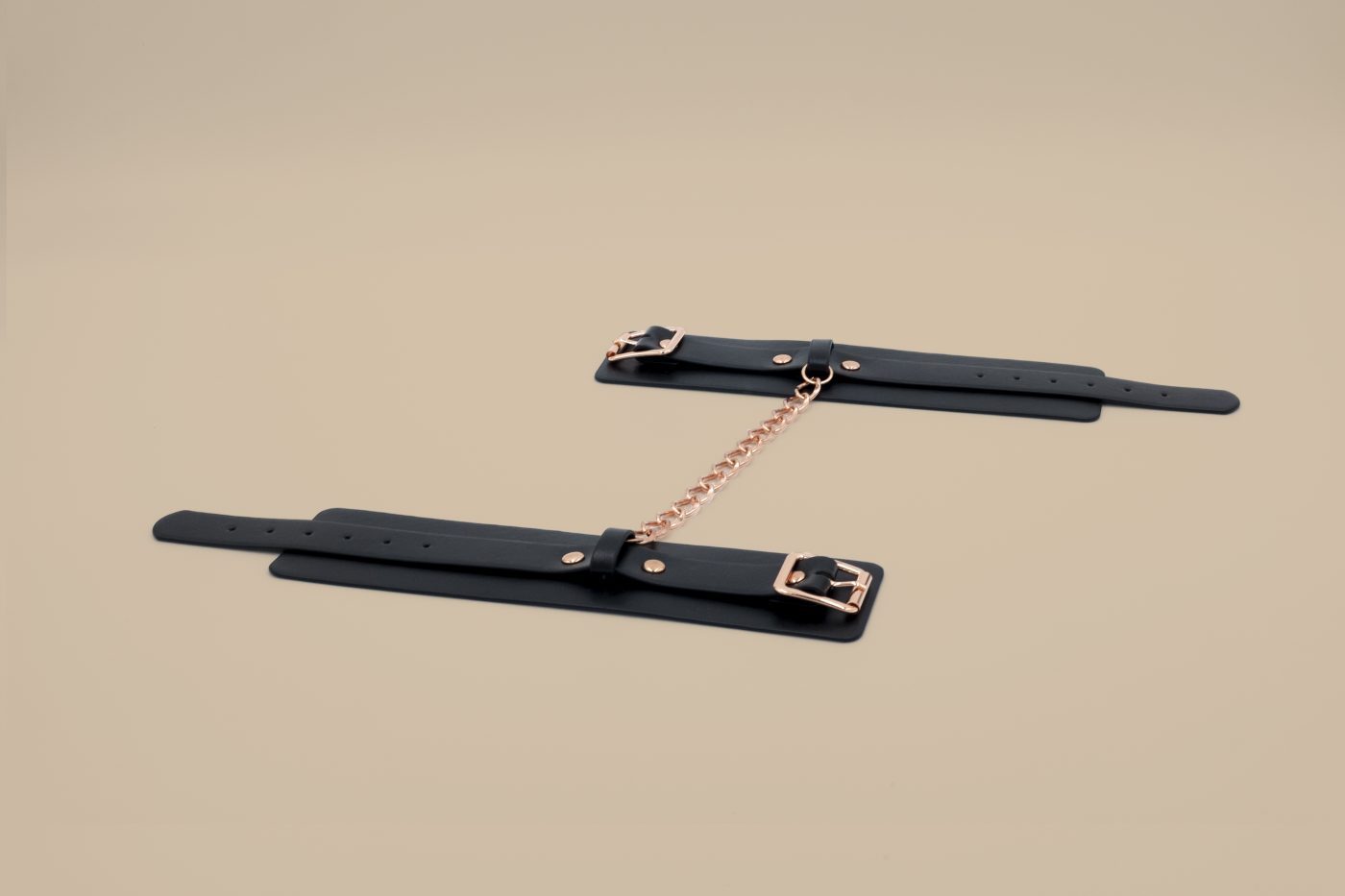 Handboeien zwart en rosé goud - Sensual Minded